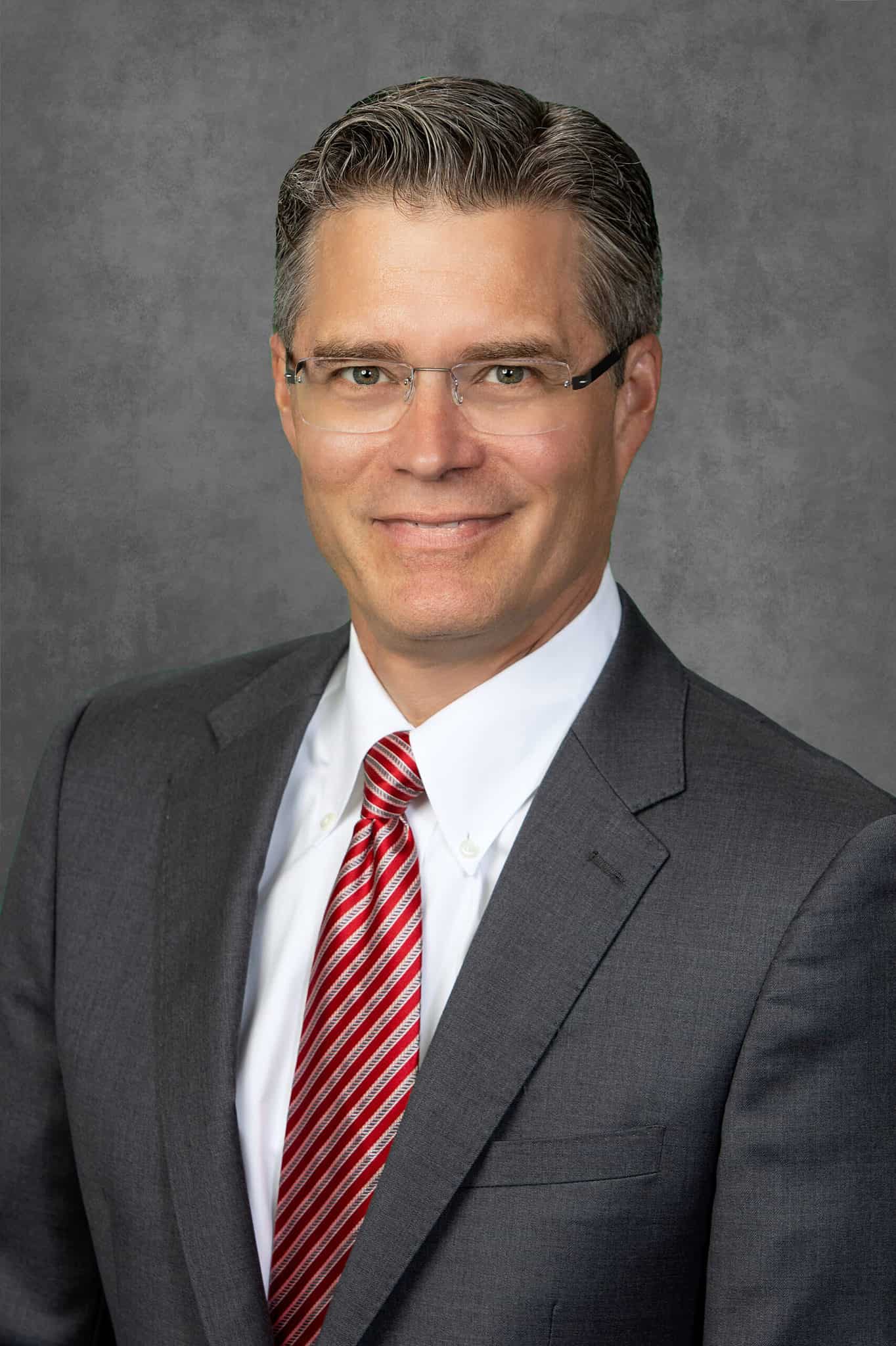 Greg E. Custer - Whittier Trust